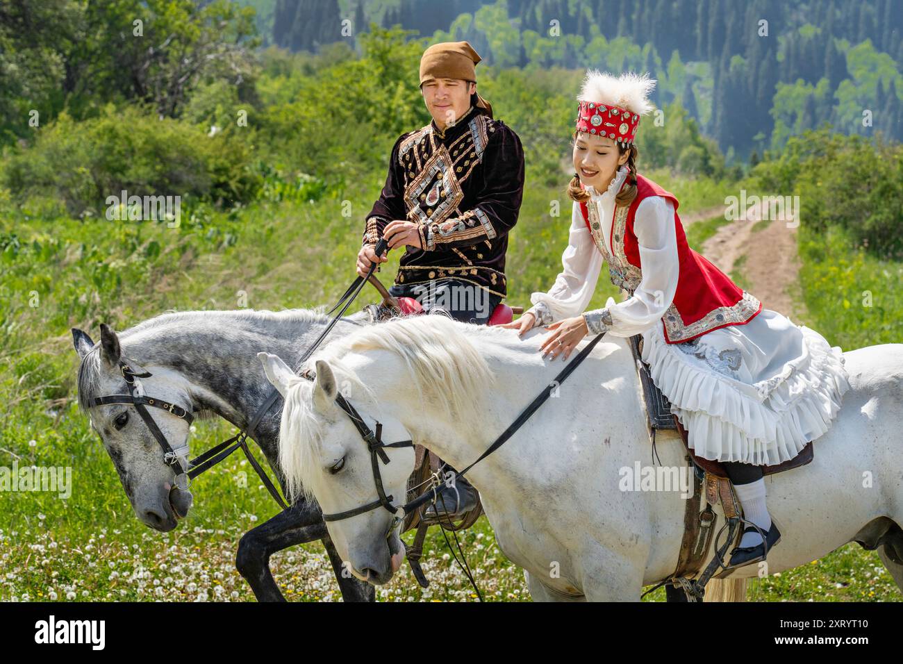 Woman in red dress riding horse hi-res stock photography and images - Alamy