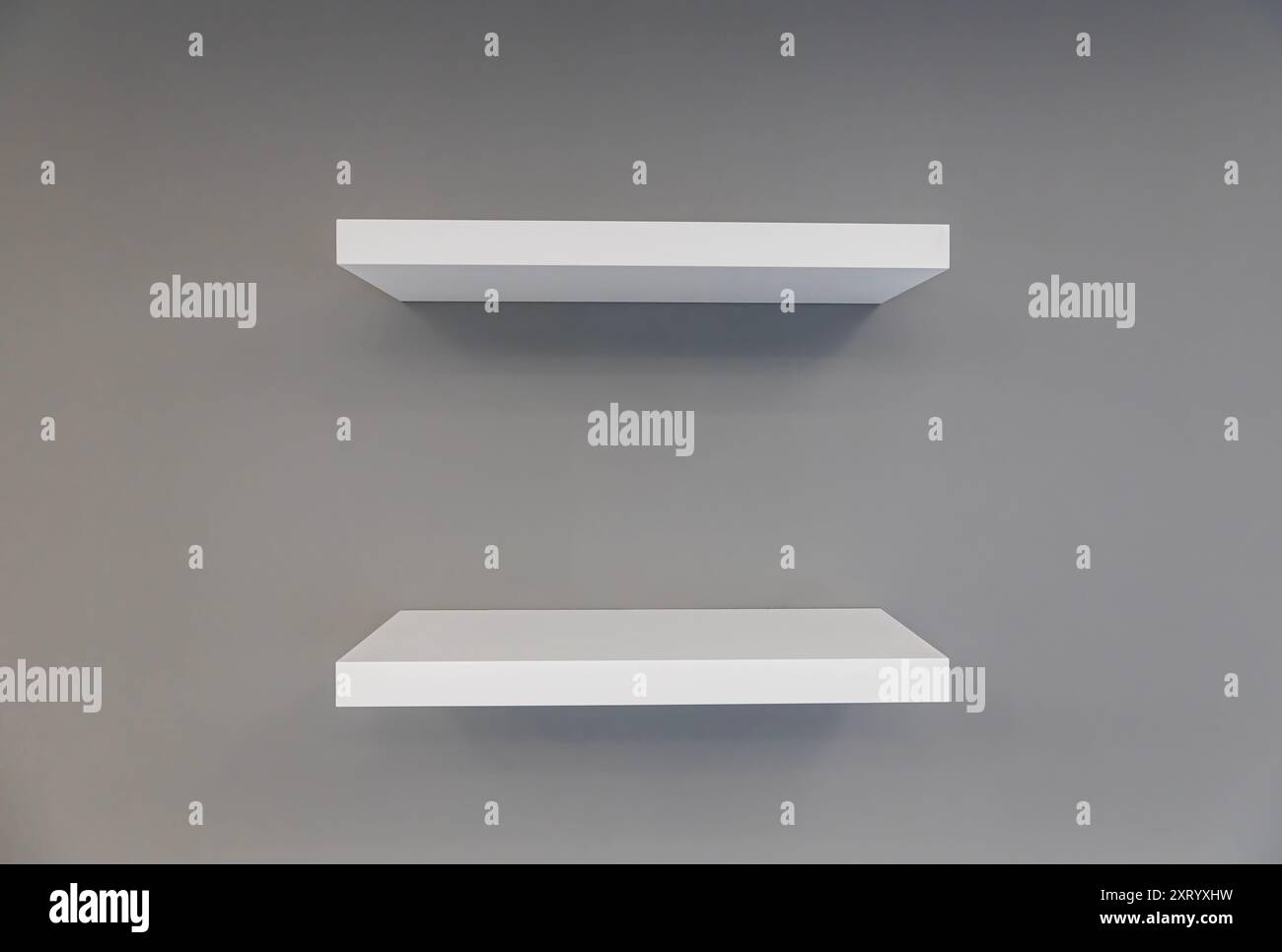 Two empty bookshelves on the wall. A design concept for your room Stock ...