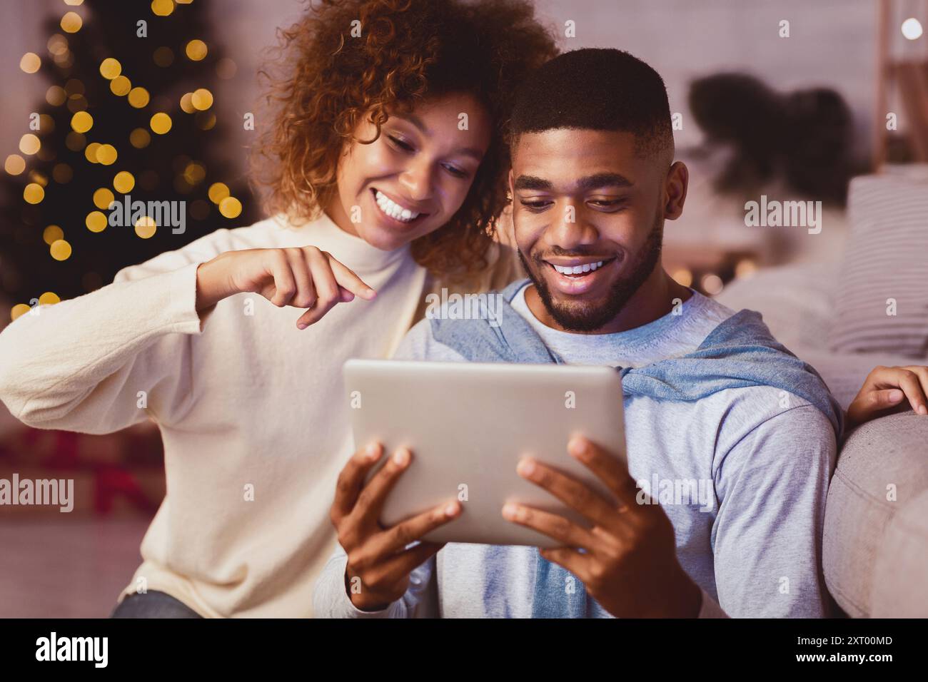 Choosing a film together hi-res stock photography and images - Alamy