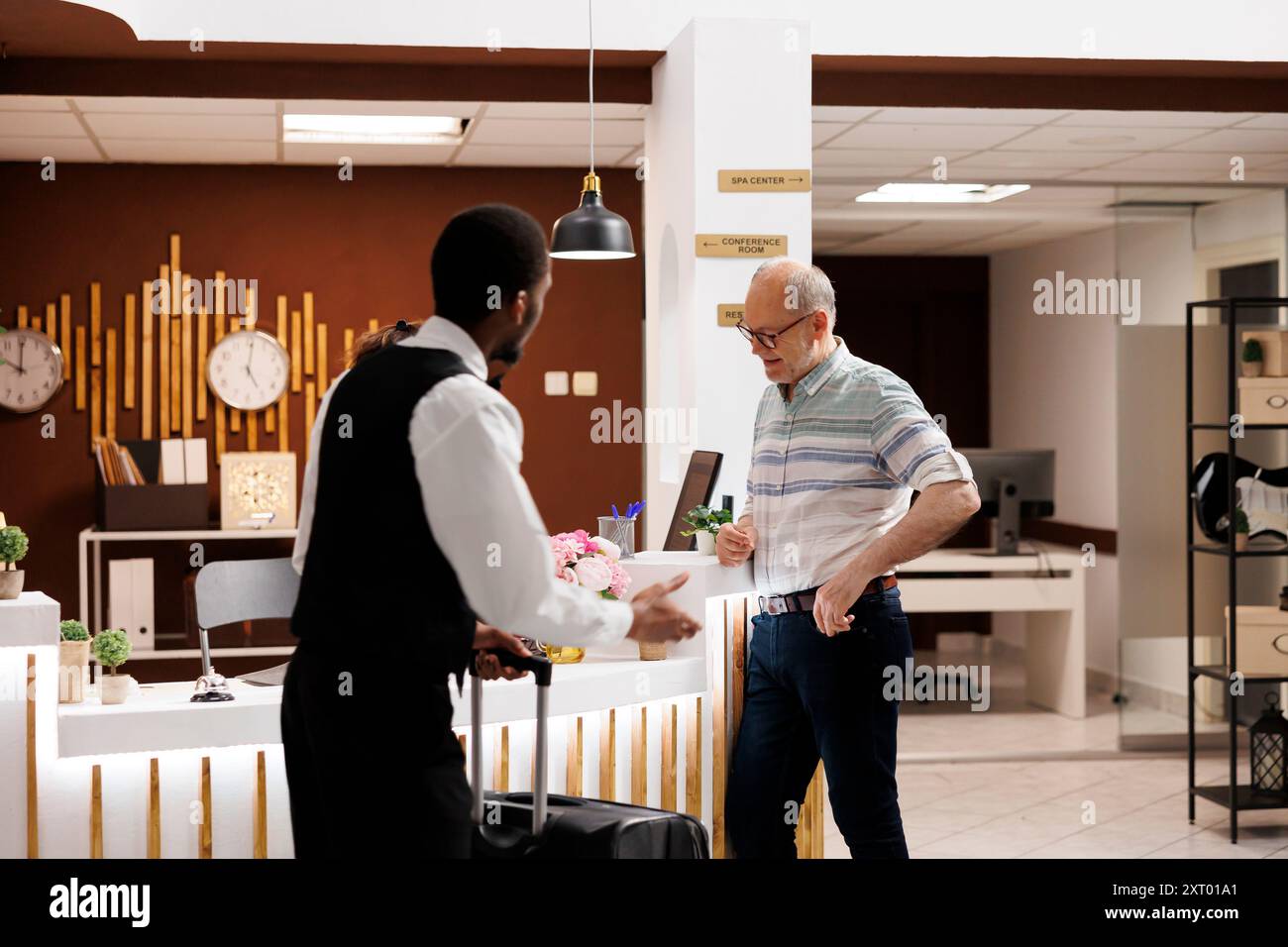 Elderly man receiving check hi-res stock photography and images - Alamy