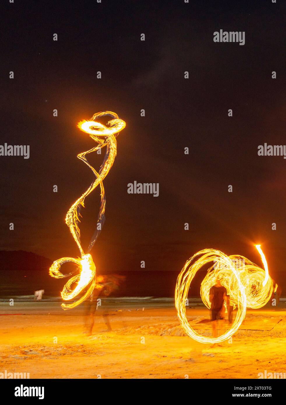 Fire artists perform spectacular and thrilling manoeuvres,fire ...