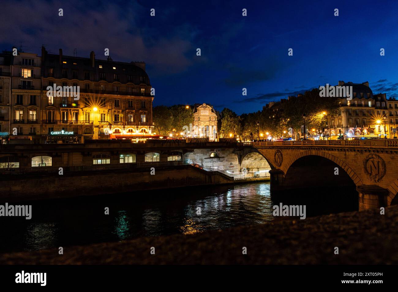 Pont Au Change, a bridge over the river Seine in Paris with Napoleon ...