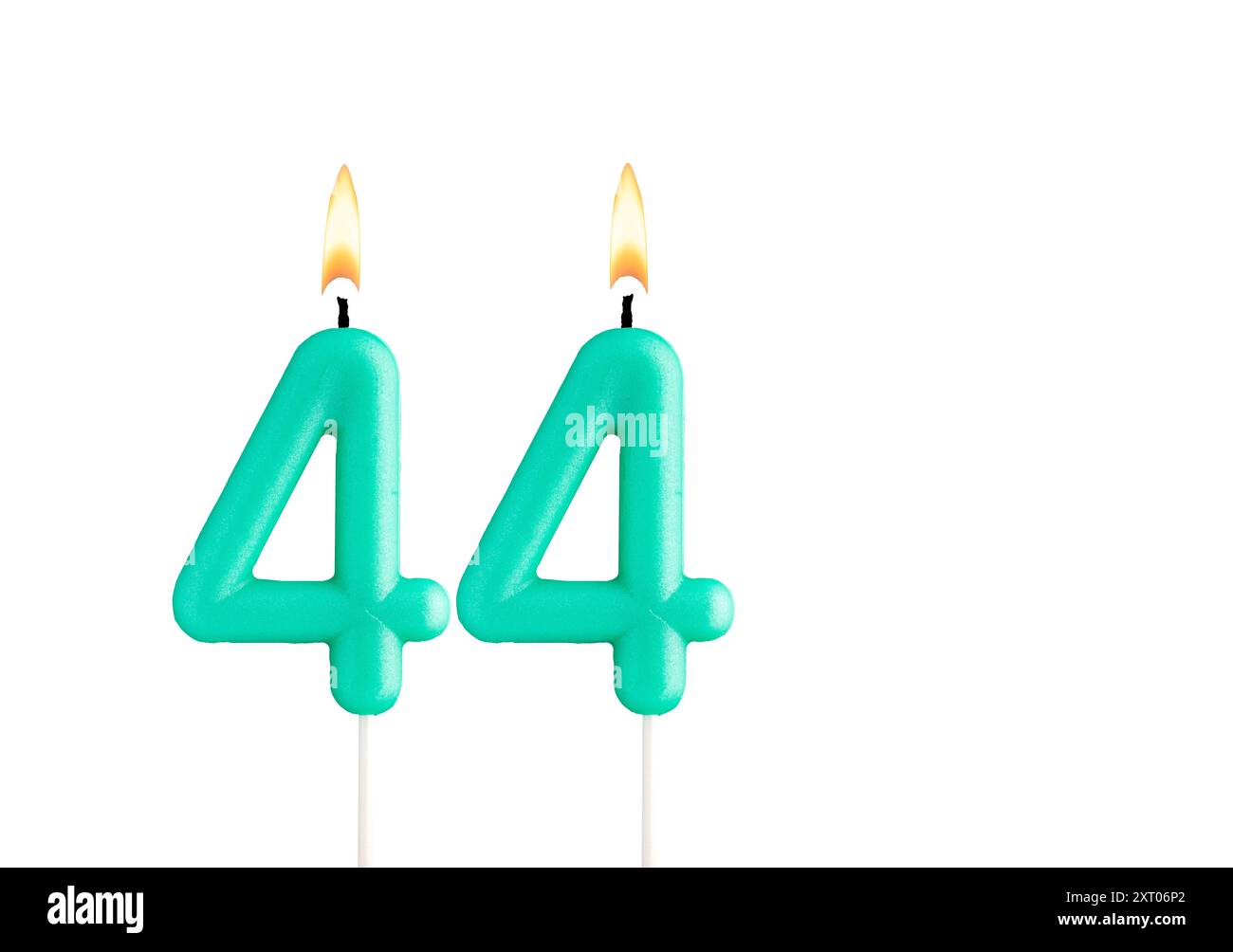Birthday number 44 - Green birthday candle on white background Stock ...