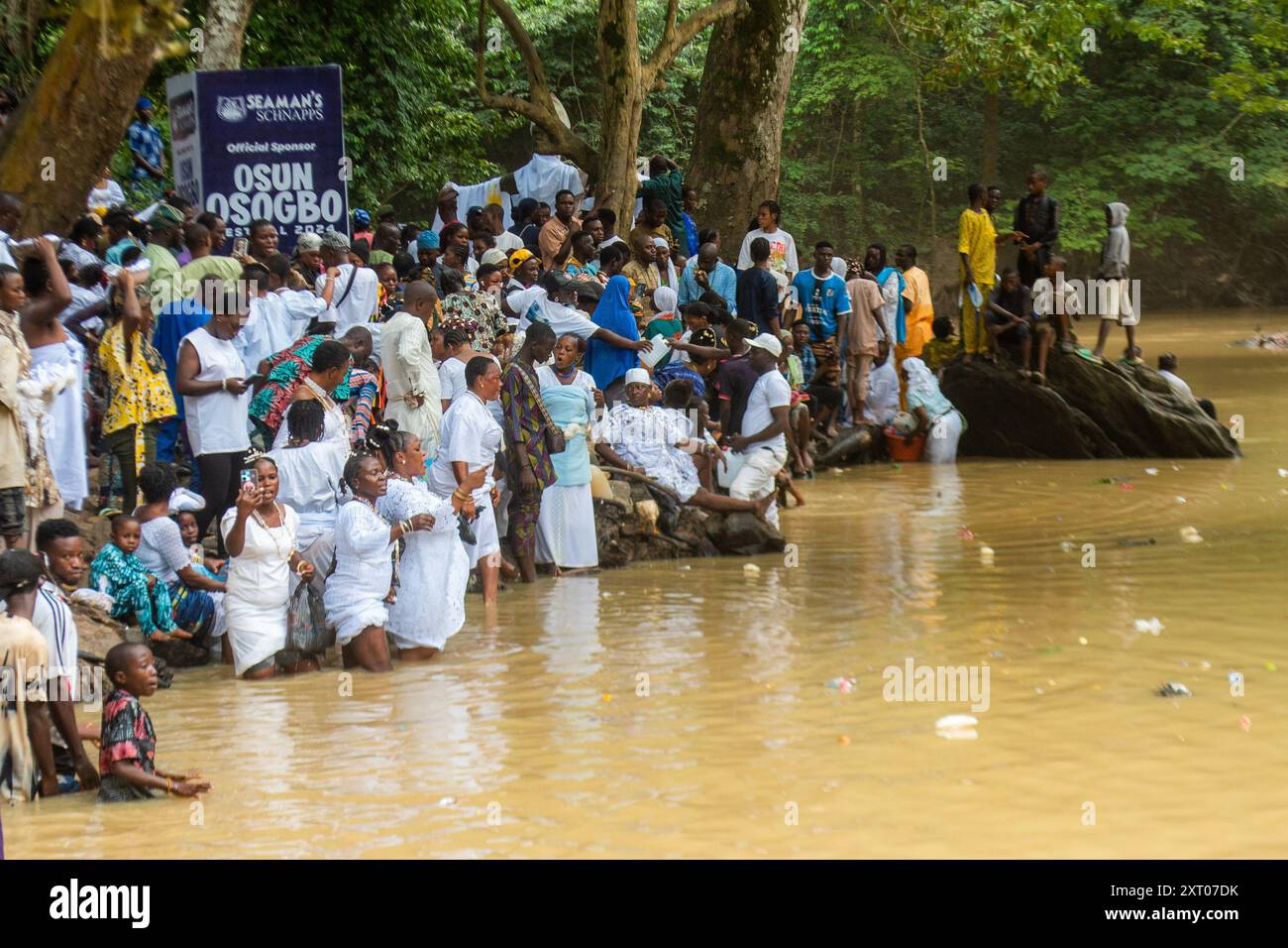 Devotees and worshippers of the Osun goddess pray at the river during ...