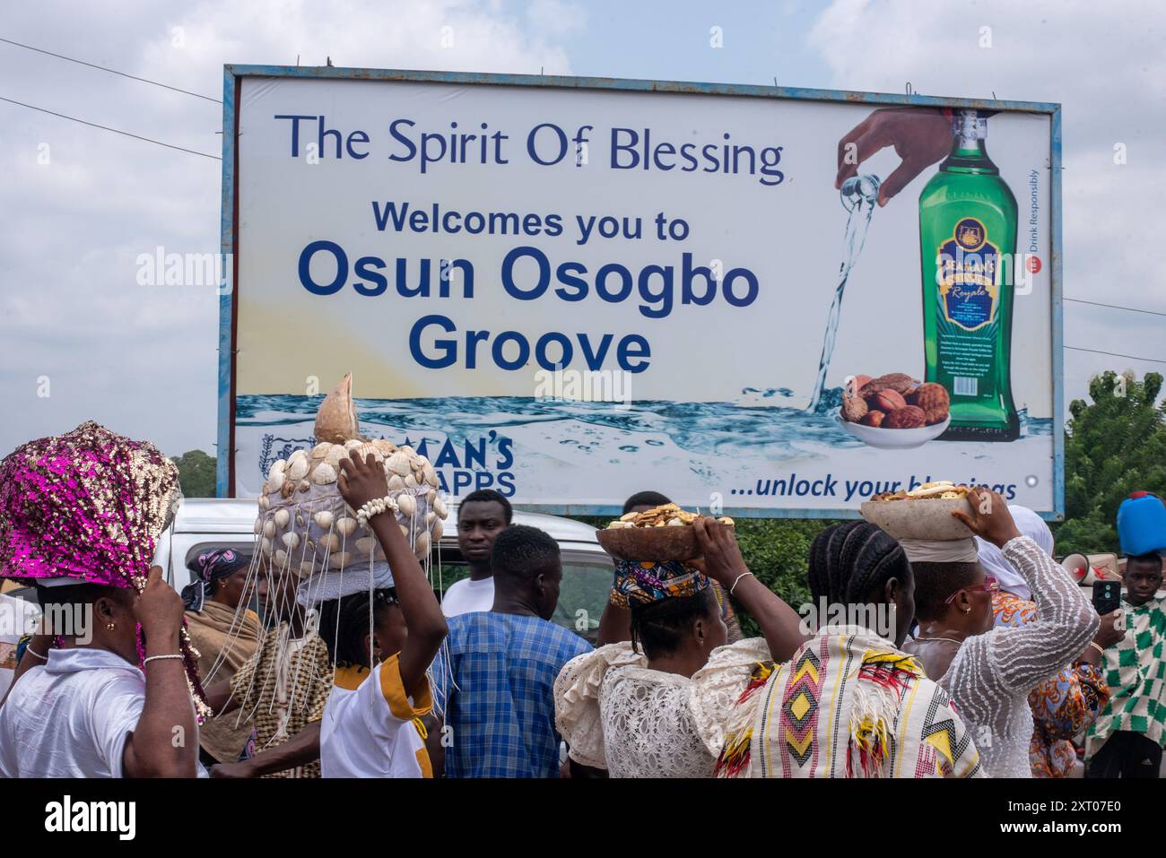 People walk in and out of the Groove during the annual Osun Osogbo ...