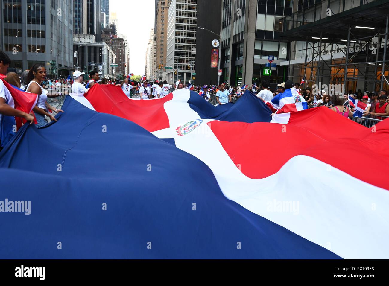 Large Dominican Flag carried by marcher at the Dominican Parade.8-11-24 ...