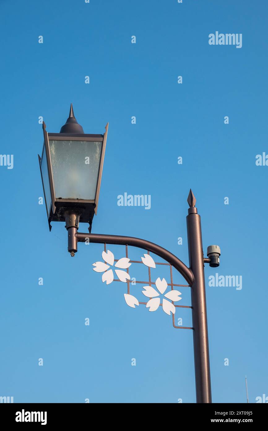 Vintage-style street lamp in Hirosaki, Japan. The street light features ...