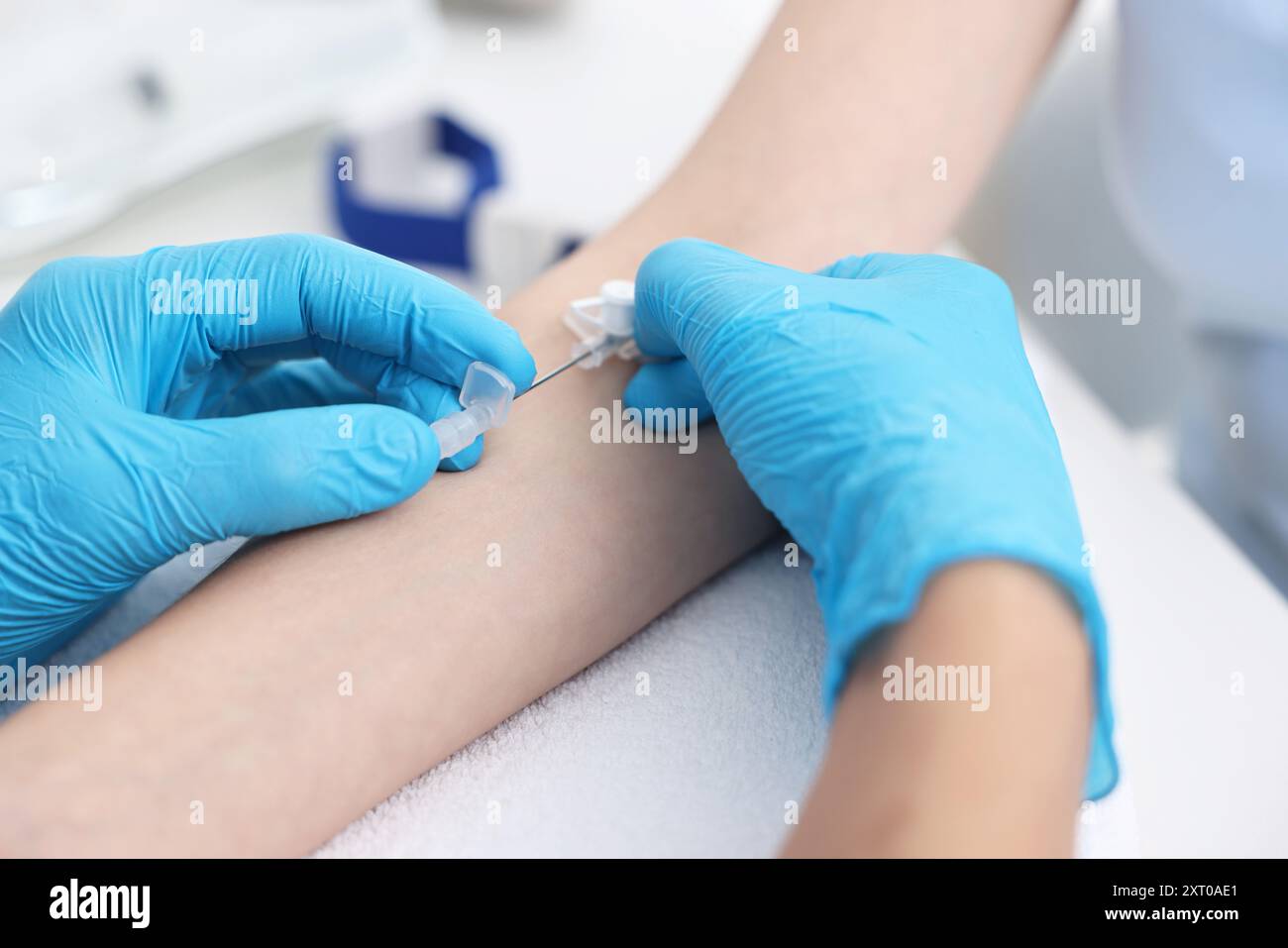 Nurse inputting catheter for IV drip in patient hand, closeup Stock ...
