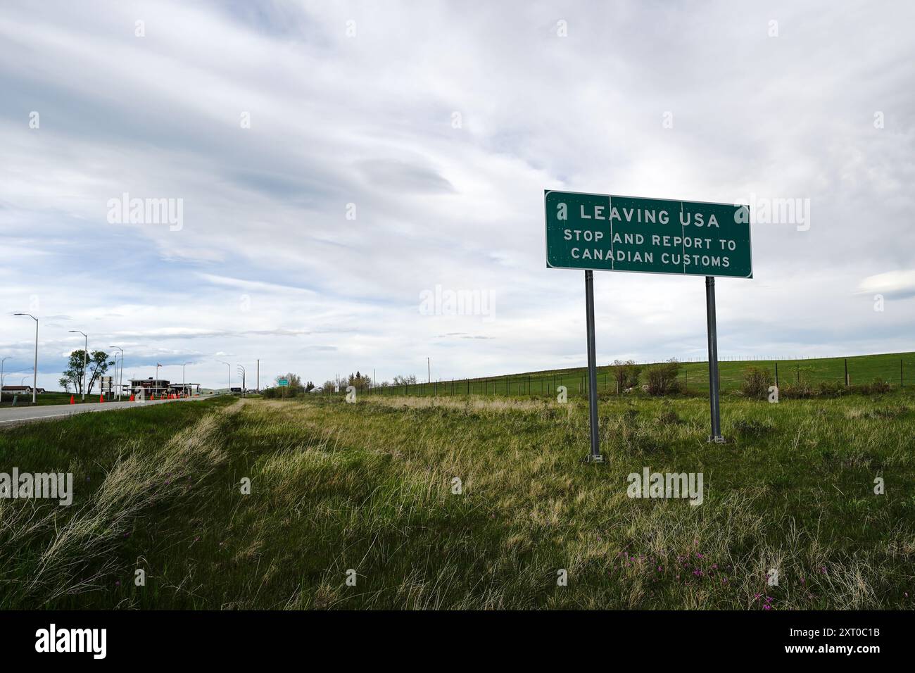 A sign directing visitors to Canadian customs at the Piegan-Carway ...