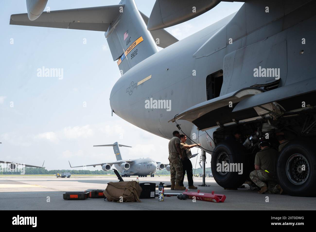 U.S. Air Force Airmen from the 437th Aircraft Maintenance Squadron fix ...