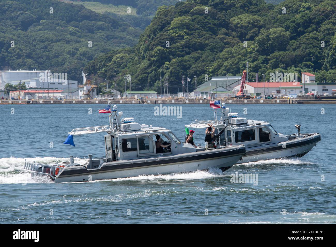 Sailors assigned to Commander, Fleet Activities Sasebo (CFAS) intercept ...