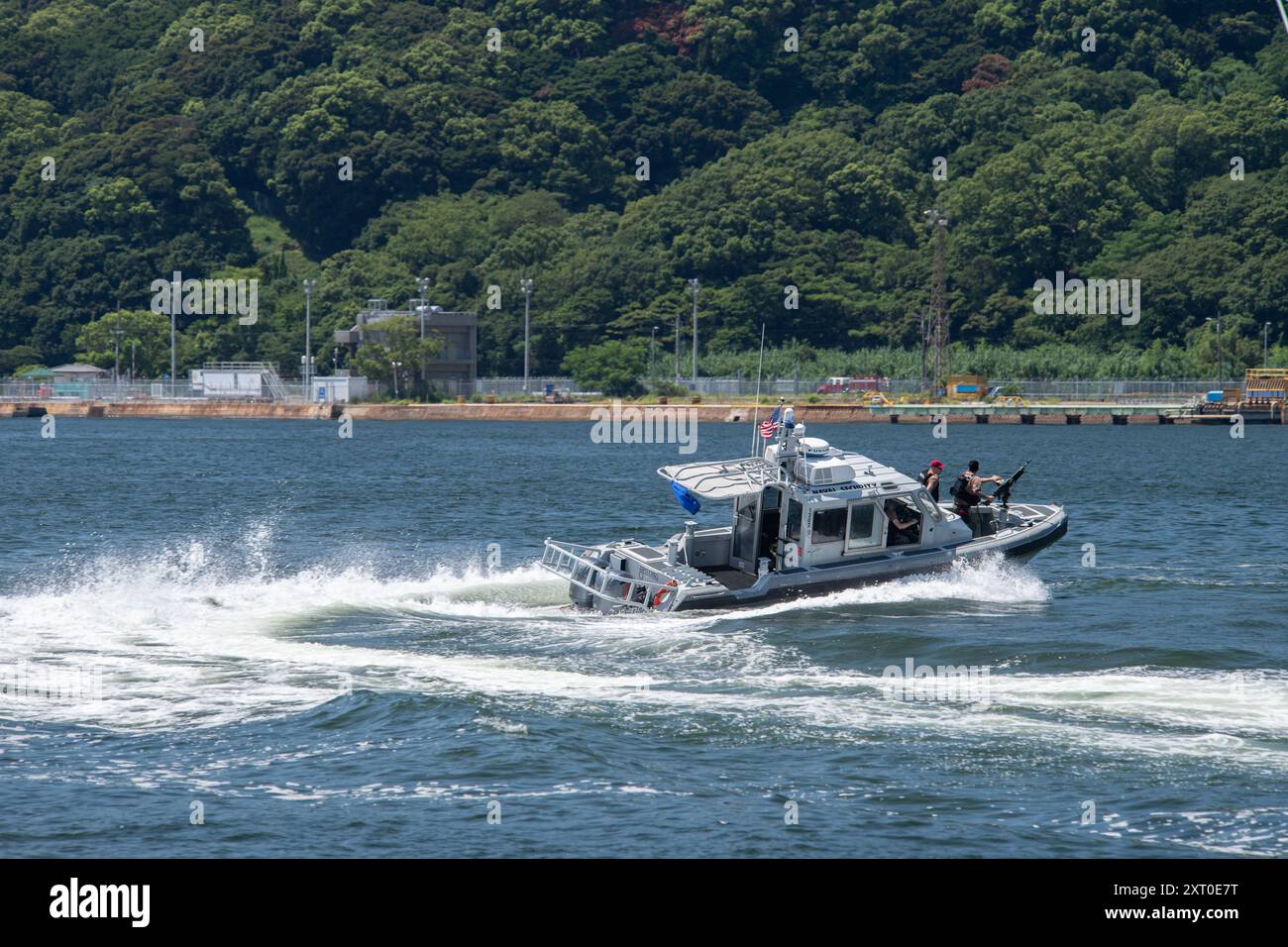 Sailors assigned to Commander, Fleet Activities Sasebo (CFAS) perform ...
