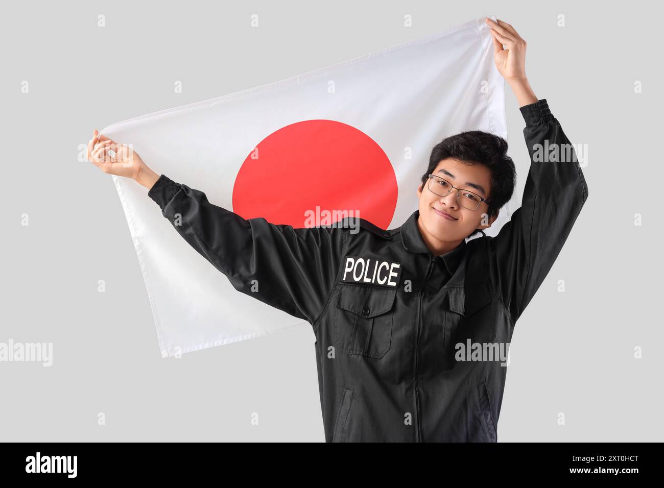 Young japanese police officer hi-res stock photography and images - Alamy