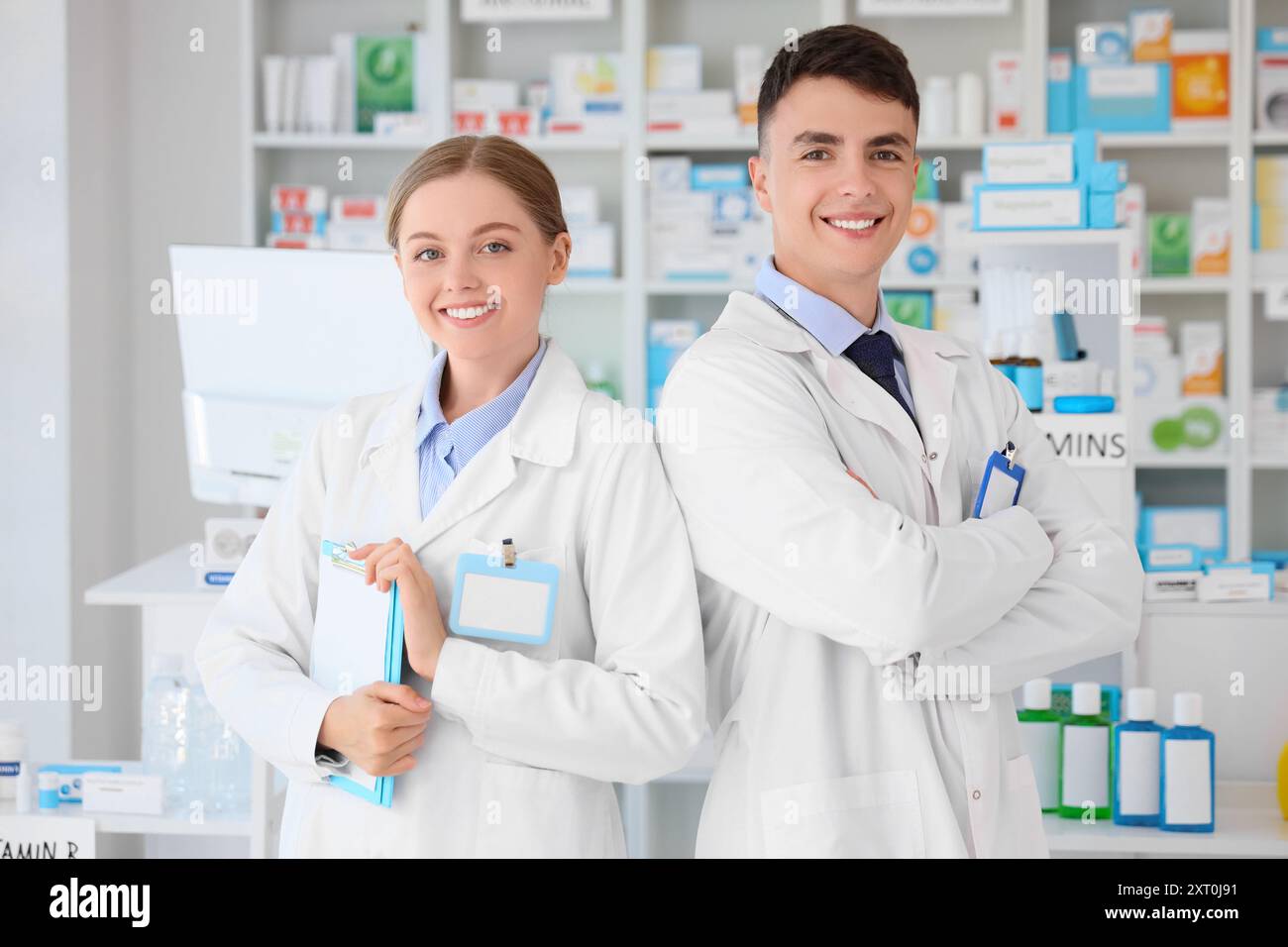 Portrait of young pharmacists at pharmacy Stock Photo - Alamy