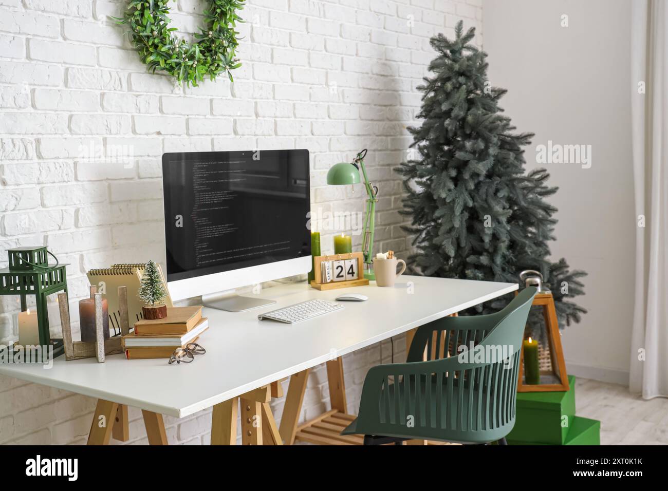 Interior of programmer's office with workplace and Christmas tree Stock ...