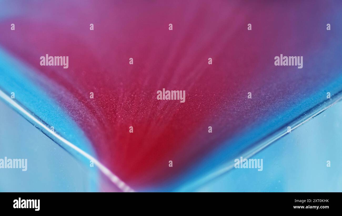 Wet glitter spill. Blur colors. Defocused pink blue shimmering ...
