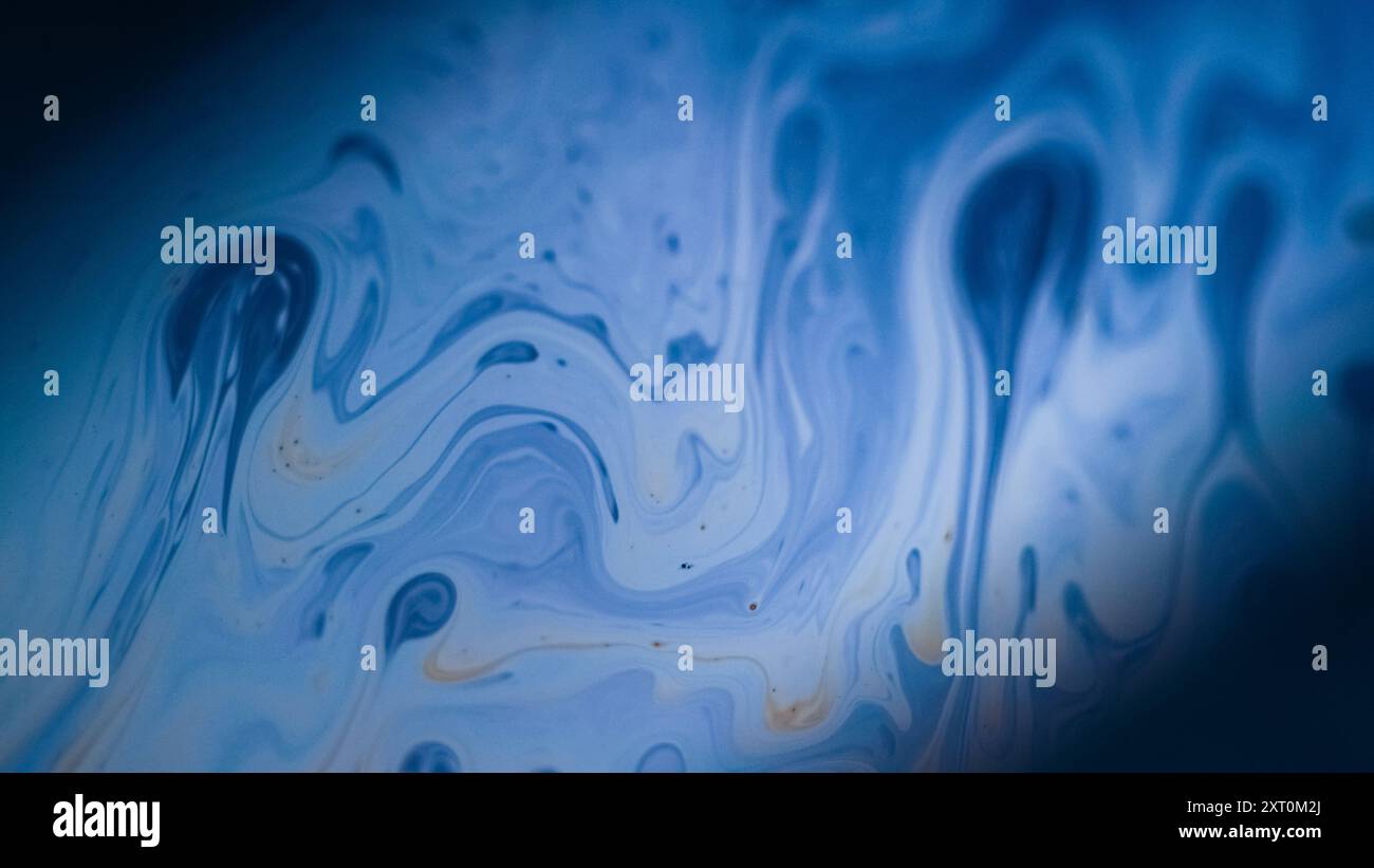 Fluid spill. Blur ink mix. Defocused blue yellow color acrylic liquid ...