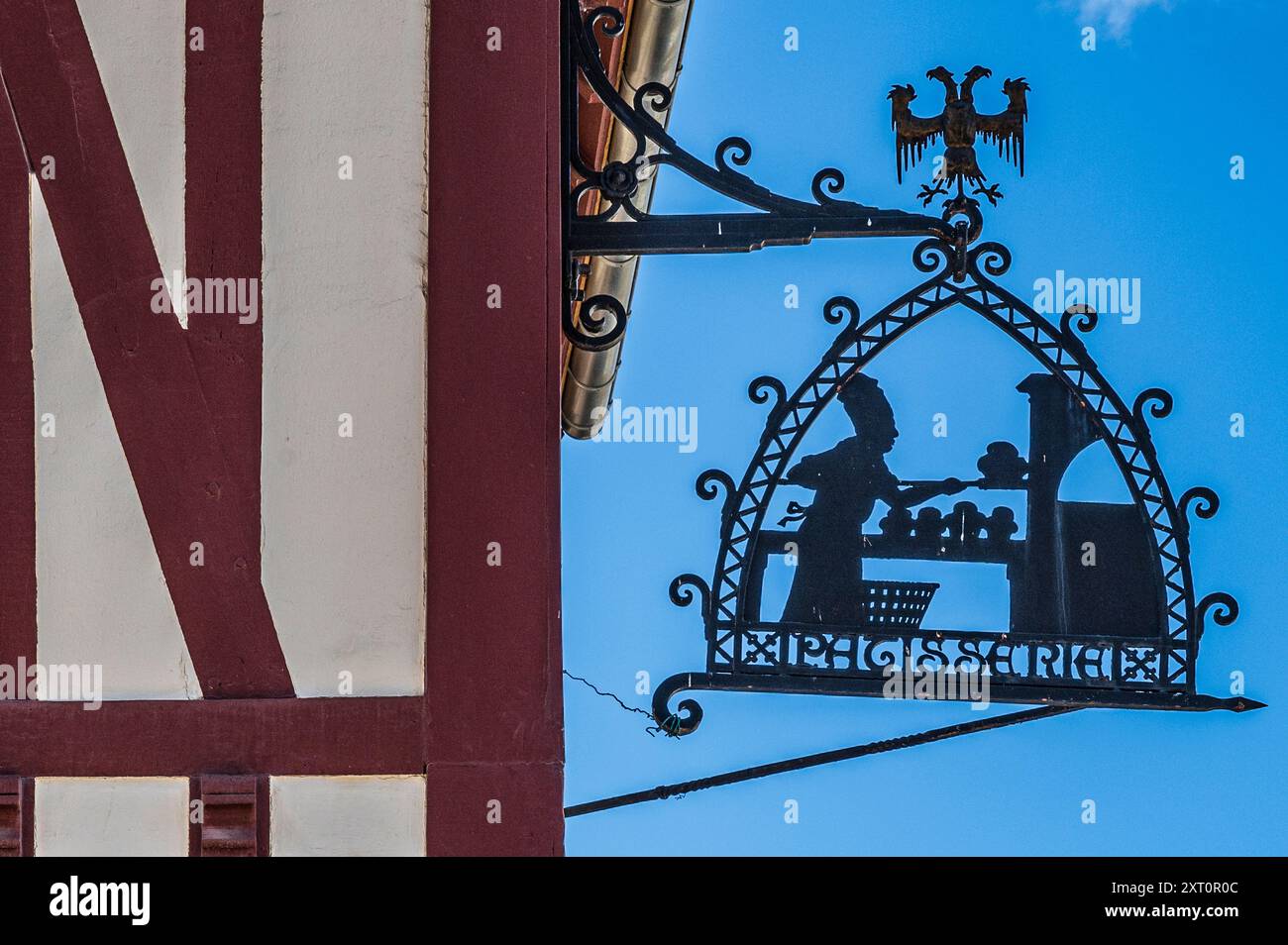 A traditional metal sign of a cake-baker in Normandy Stock Photo - Alamy