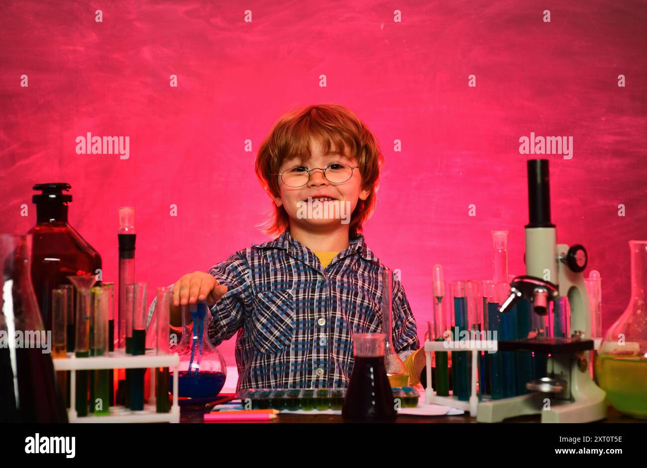 Little kids scientist earning chemistry in school lab. Science. Happy ...