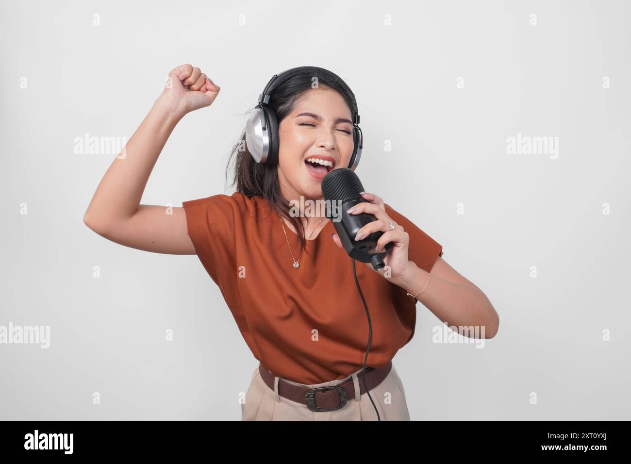Happy woman dancing isolated over hi-res stock photography and images ...