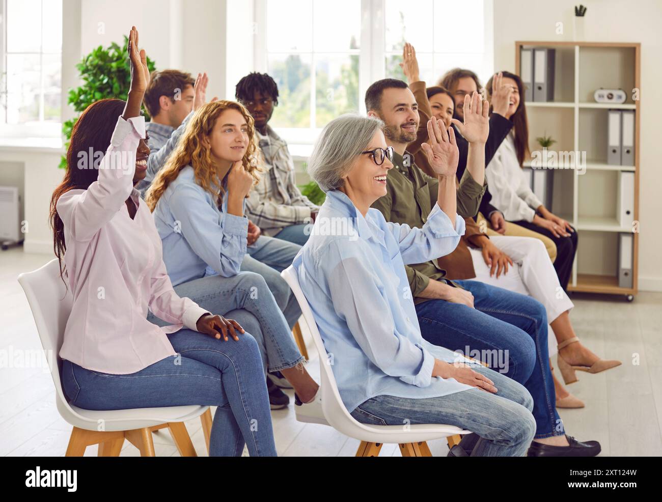 Business person raising hand speaker hi-res stock photography and ...