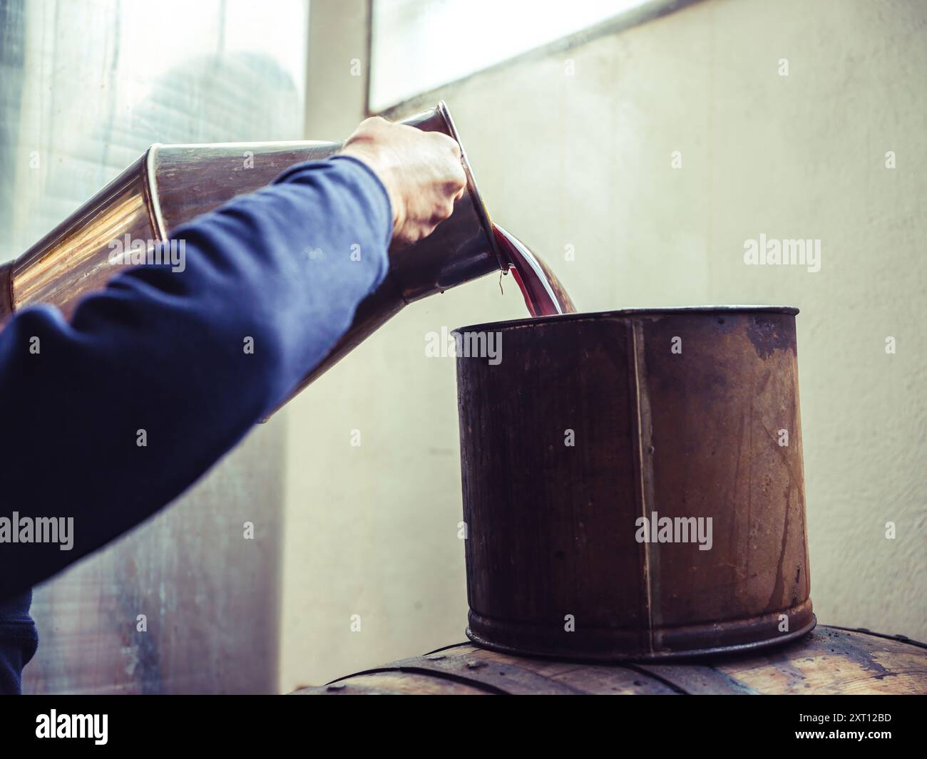 Anonymous person in the traditional preparation of the Palo de Mallorca ...