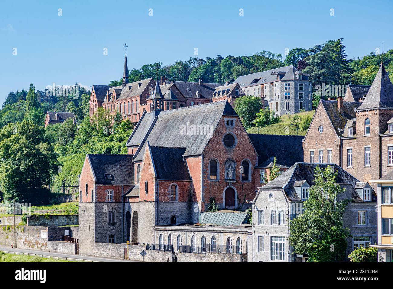 Buildings of former Capuchin convent with Leffe mansion on mountain ...
