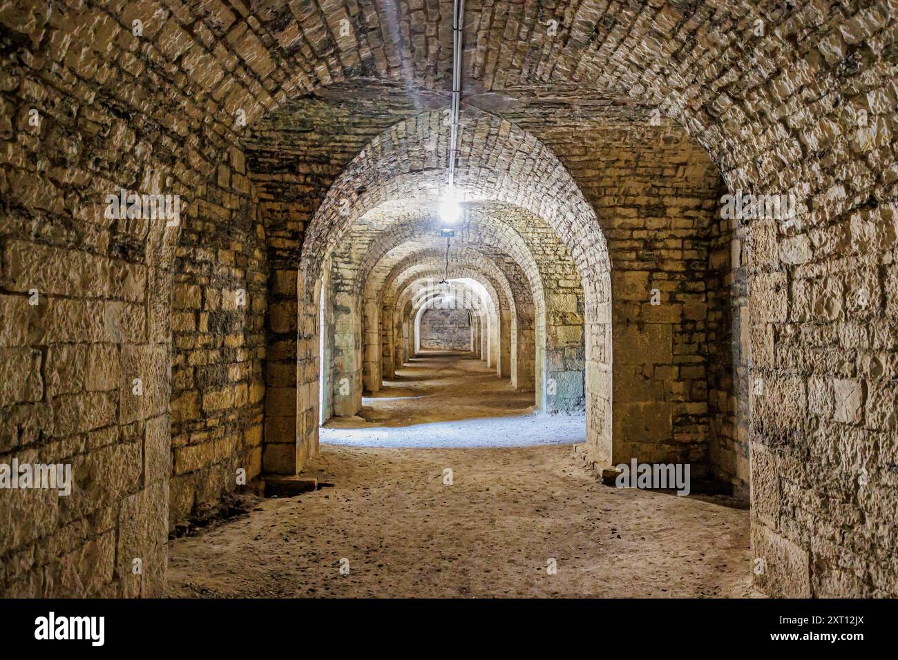 Dark cave interior arched hi-res stock photography and images - Alamy