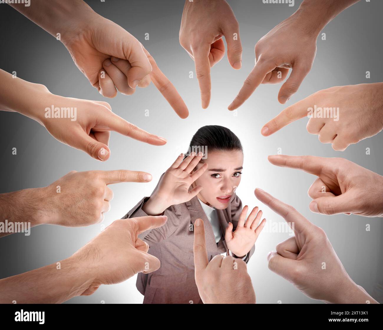 People pointing at scared woman on grey background. Social pressure ...