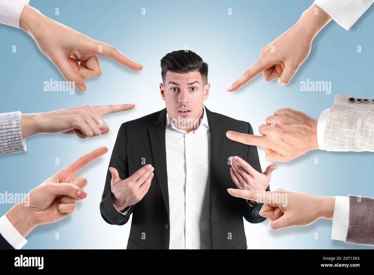People pointing at shocked man on light blue background. Social ...