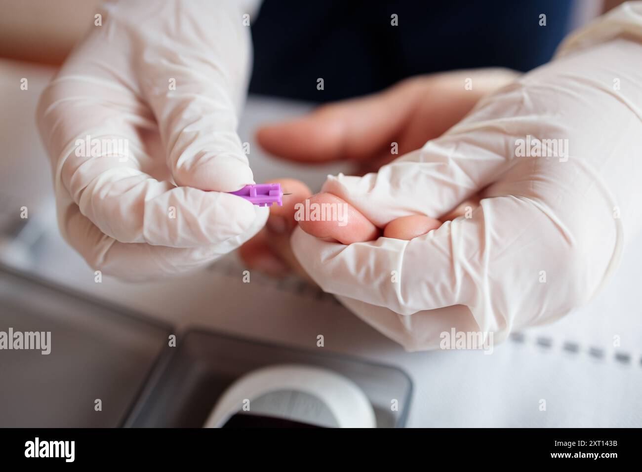 Blood glucose monitoring fingerstick hi-res stock photography and ...