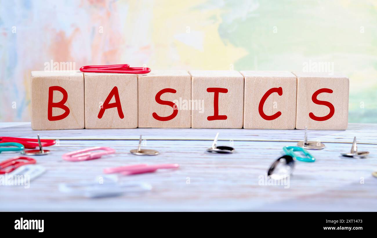 Basics word written assembled from cubes on a yellow background Stock ...