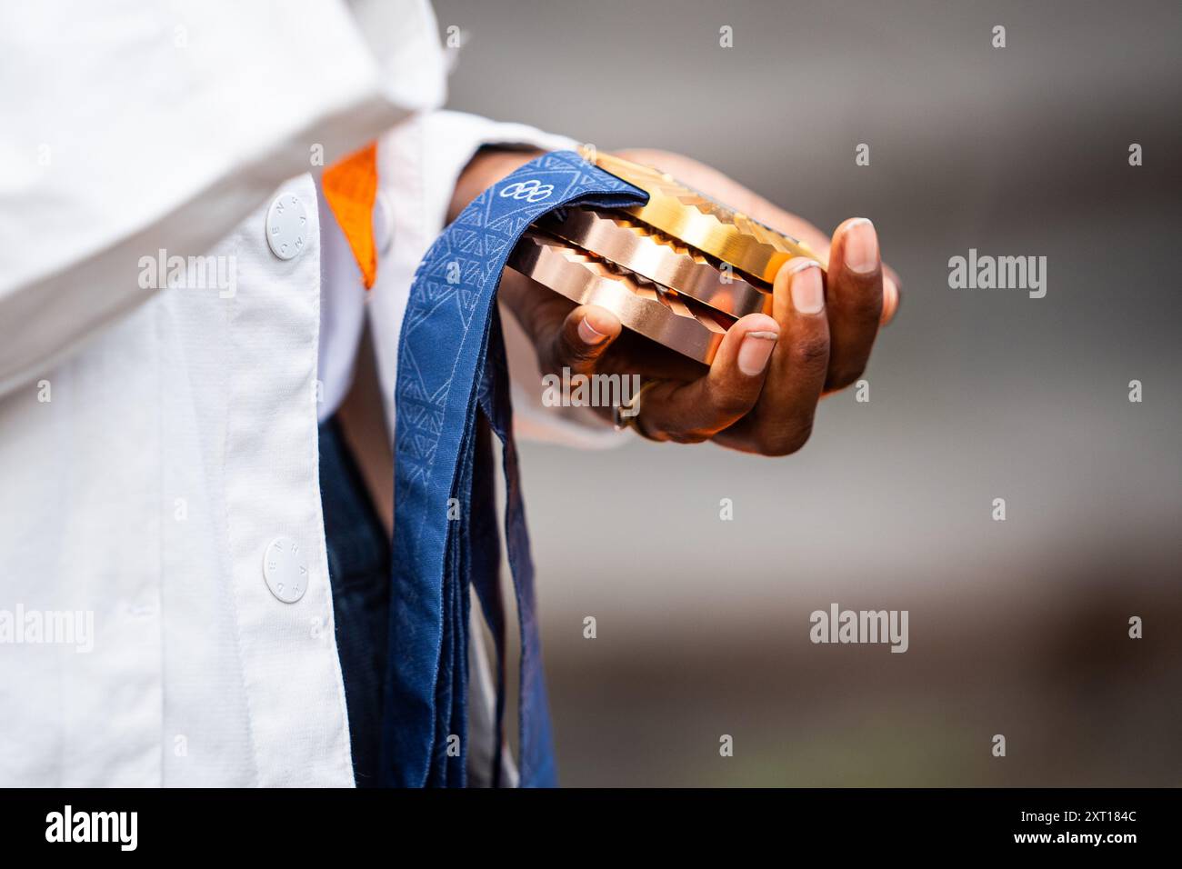 THE HAGUE - Sifan Hassan with her medals in her hand arrives at the ...