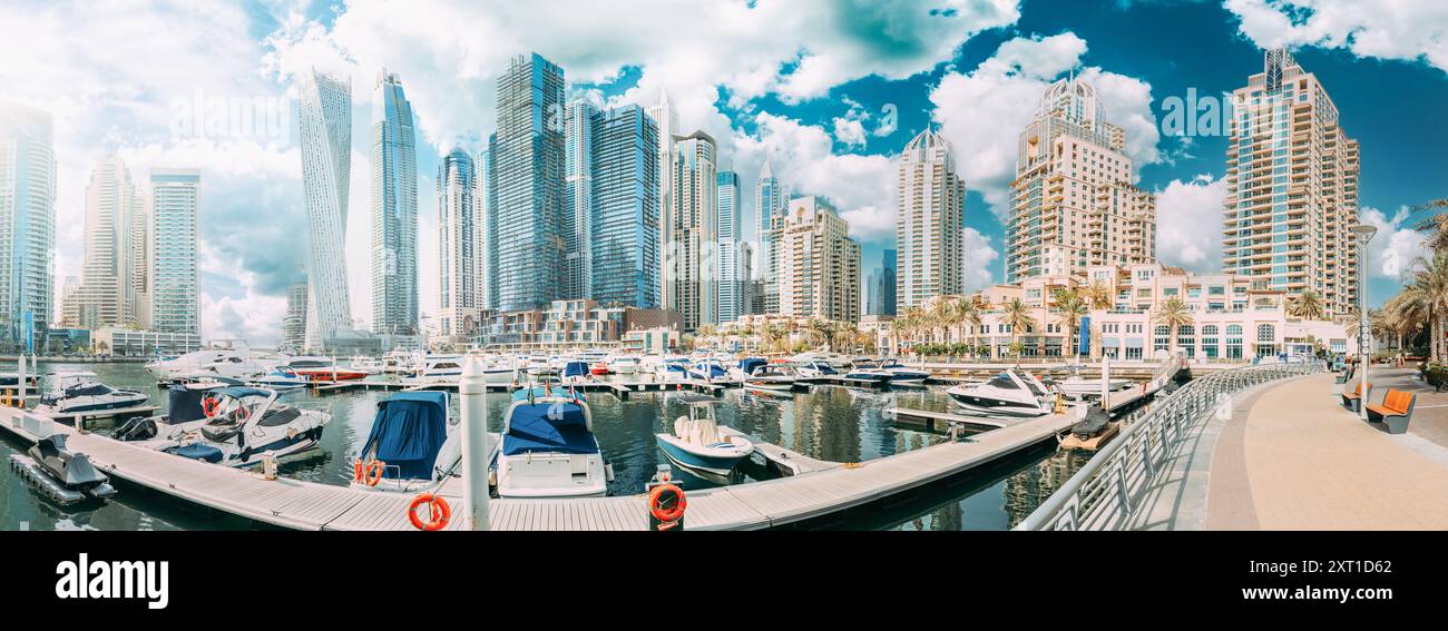 Dubai Marina Port, UAE, United Arab Emirates. Yachts are moored at city ...