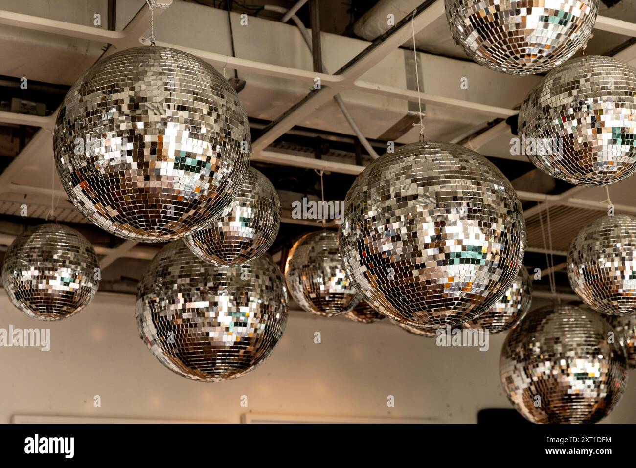 Spinning pink disco ball blue hi-res stock photography and images - Alamy