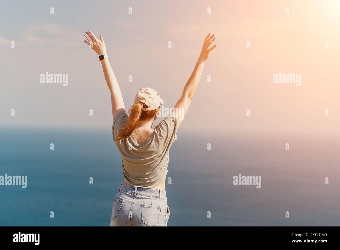 Woman reaching towards sky hi-res stock photography and images - Alamy