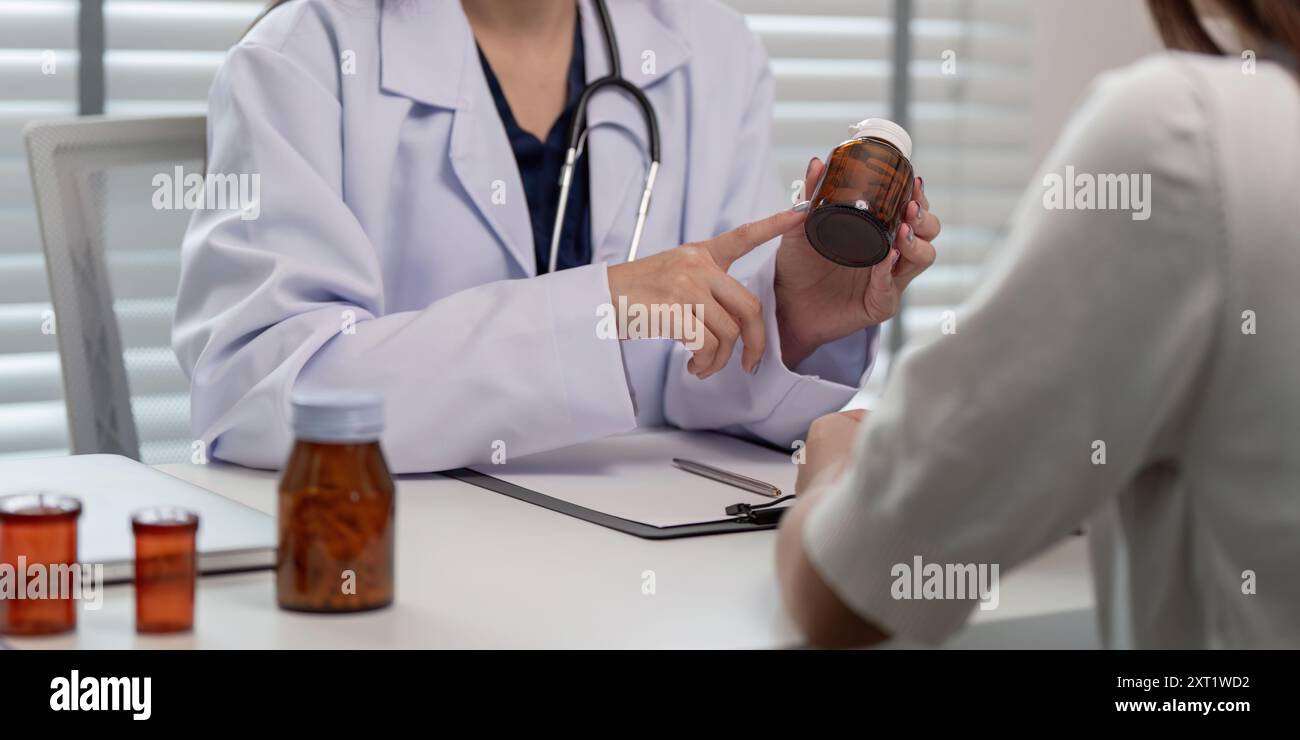 Doctor Consulting Patient and Prescribing Medication in a Modern ...