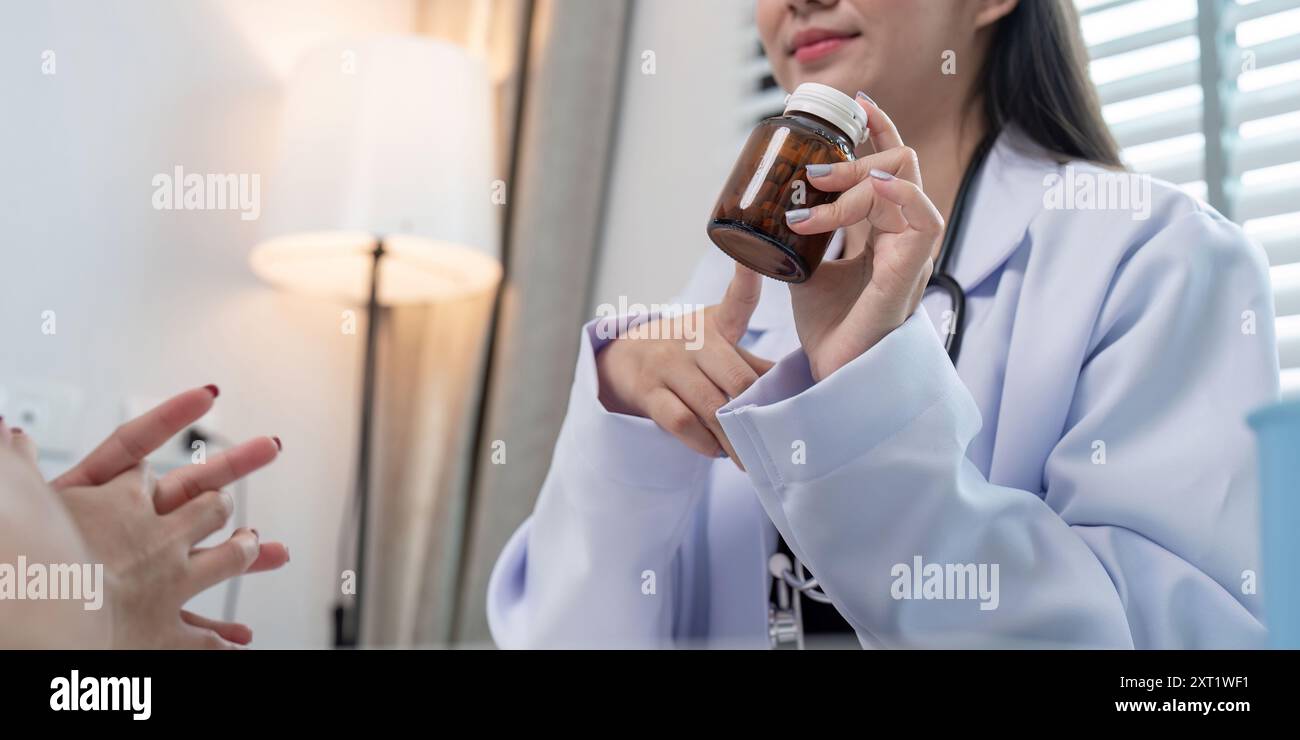 Doctor prescribing medicine during medical hi-res stock photography and ...