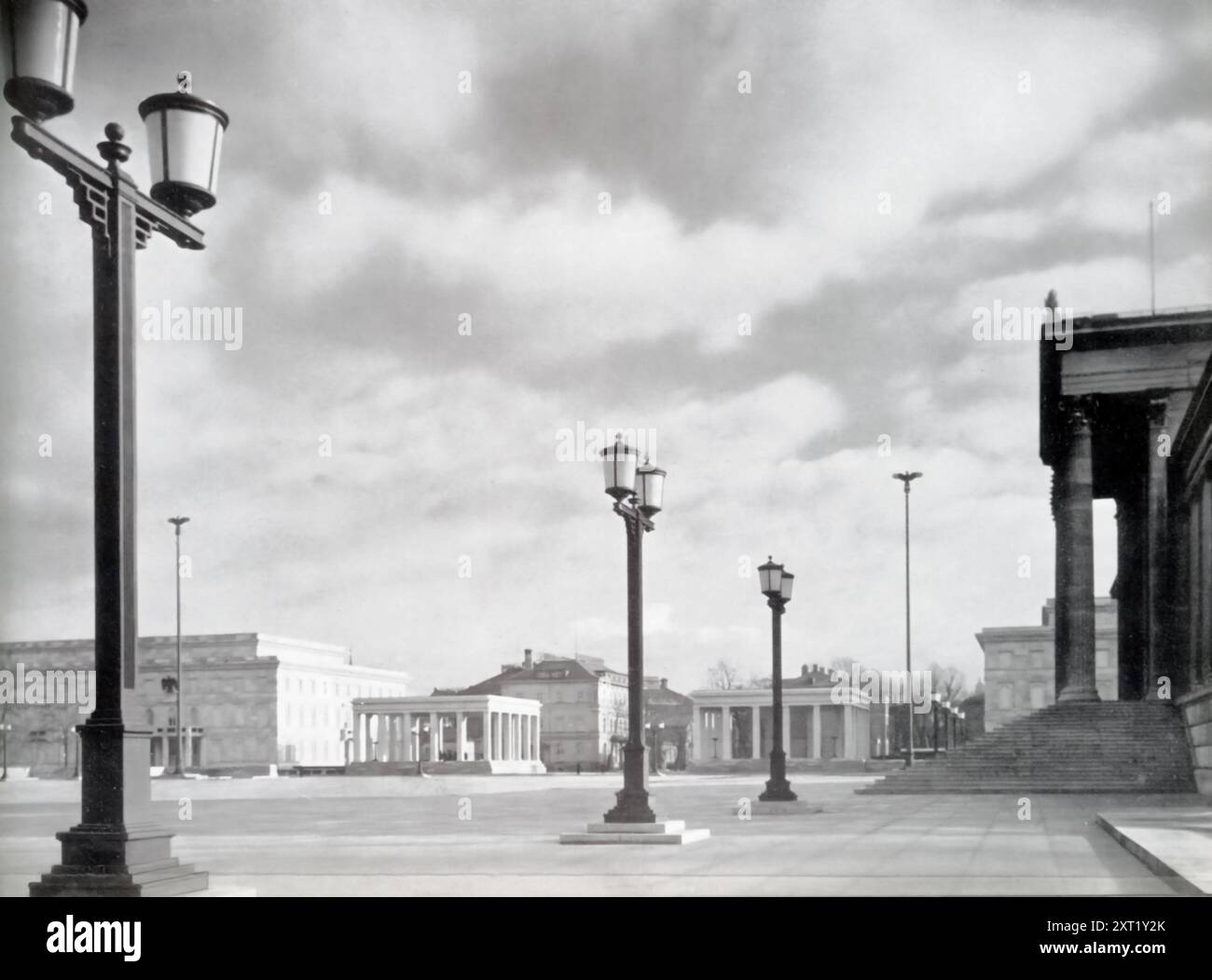 A photograph shows the Königsplatz in Munich, featuring the Eternal ...