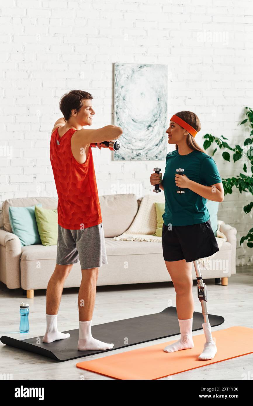 A woman with a prosthetic leg works out with her boyfriend in their ...
