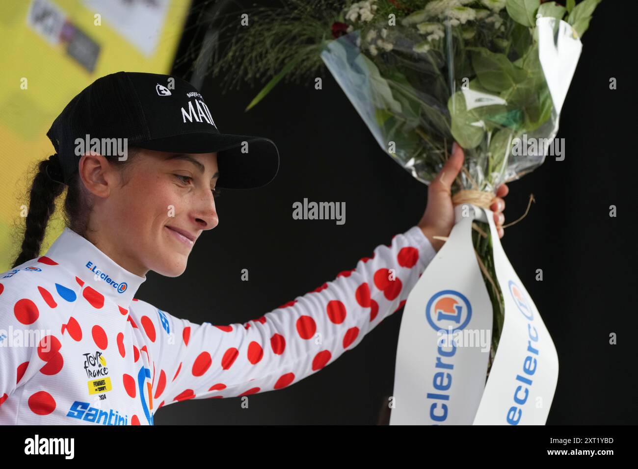 Cristina Tonetti of Italy, wearing the best climber's dotted jersey ...