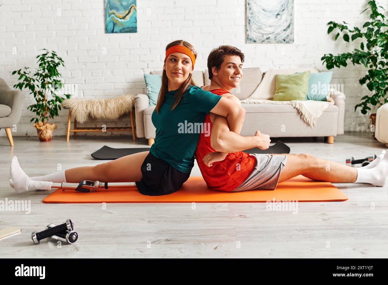 A woman with a prosthetic leg and her boyfriend do a back-to-back ...