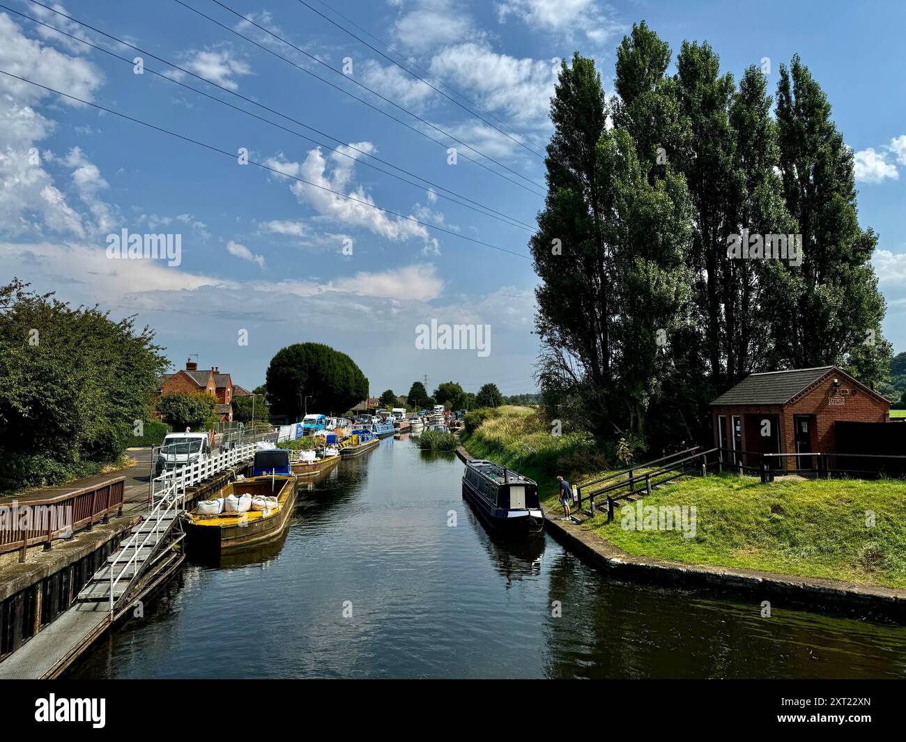 Moored on the canal under trees hi-res stock photography and images - Alamy