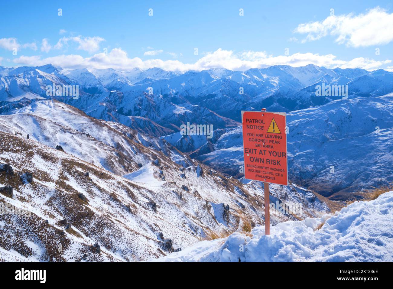 Wooden signpost marking the edge of Coronet Peak Ski Area Stock Photo ...