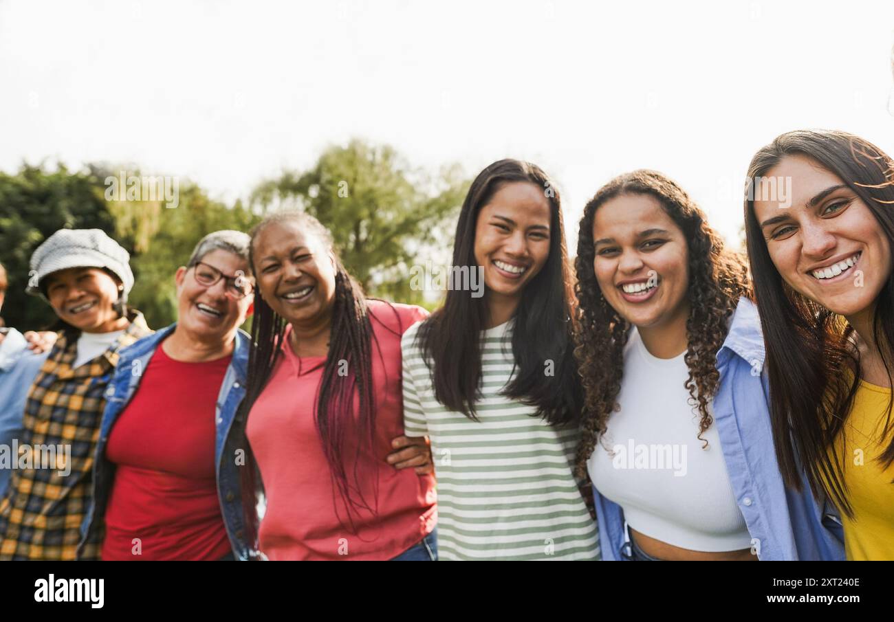 Multi generational women smiling in front of camera - Female multiracial group having fun ...