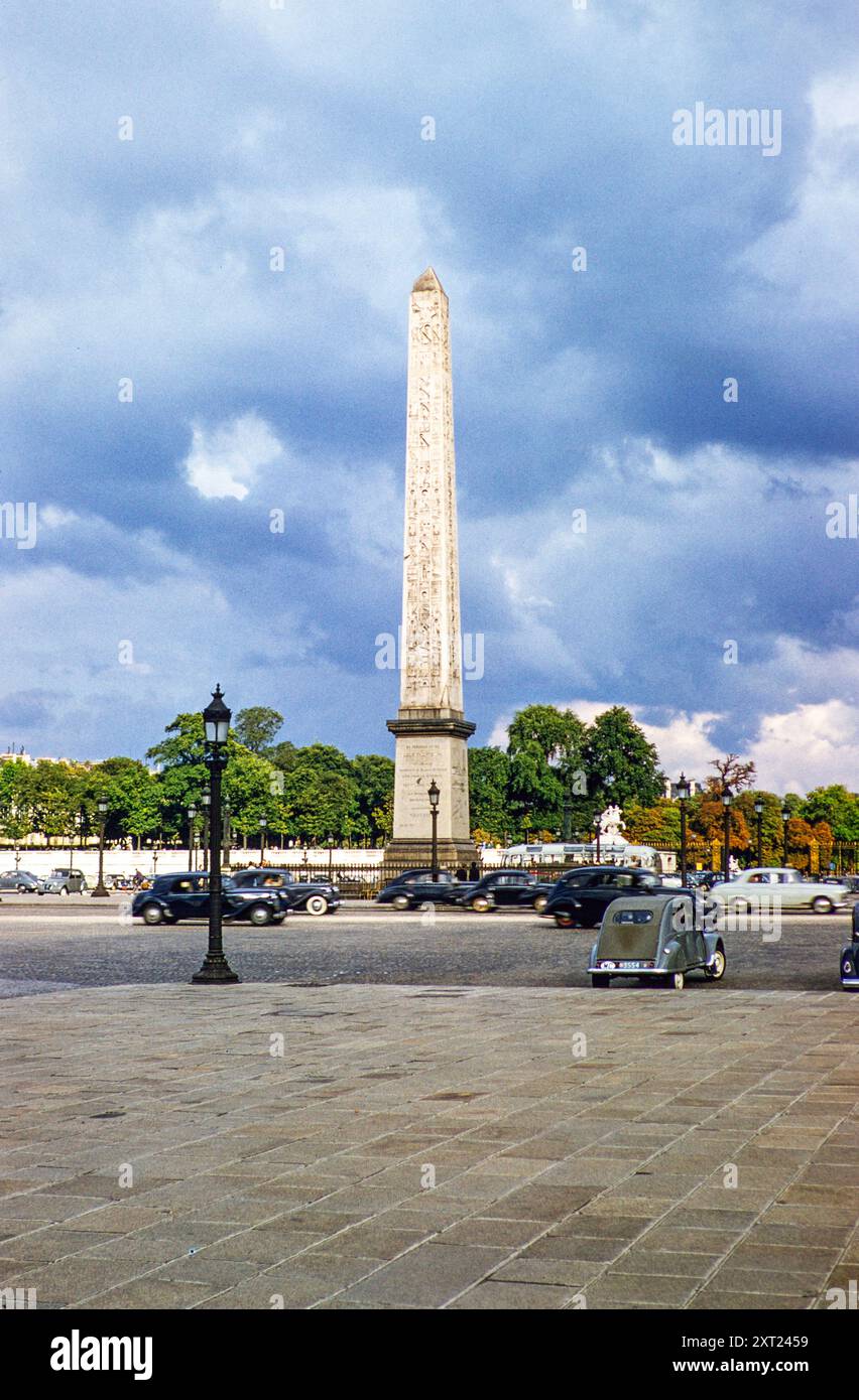 Egyptian obelisk, Place de la Concorde, Paris, France 1956 with passing ...