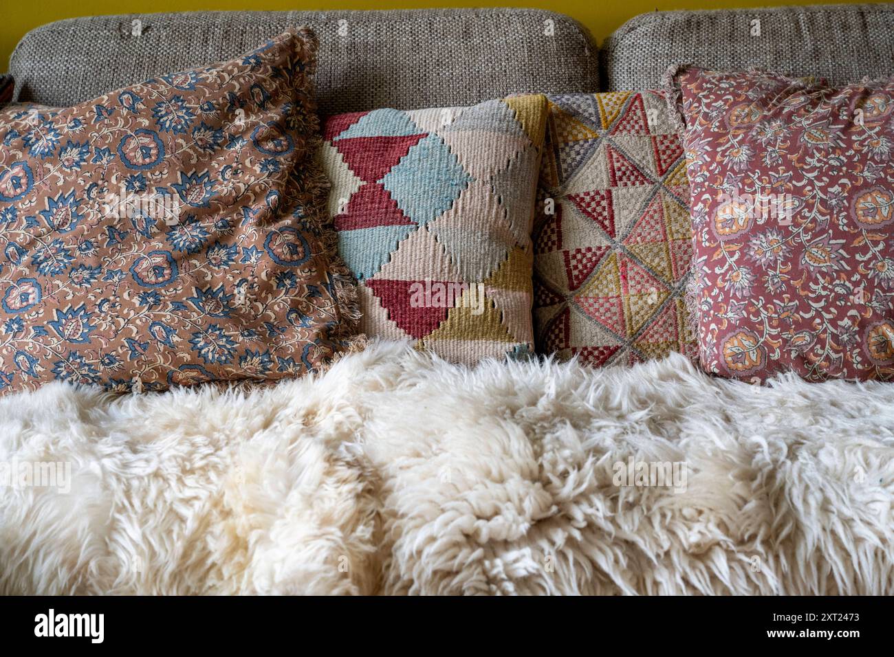 Patterned cushions in yellow hi-res stock photography and images - Alamy