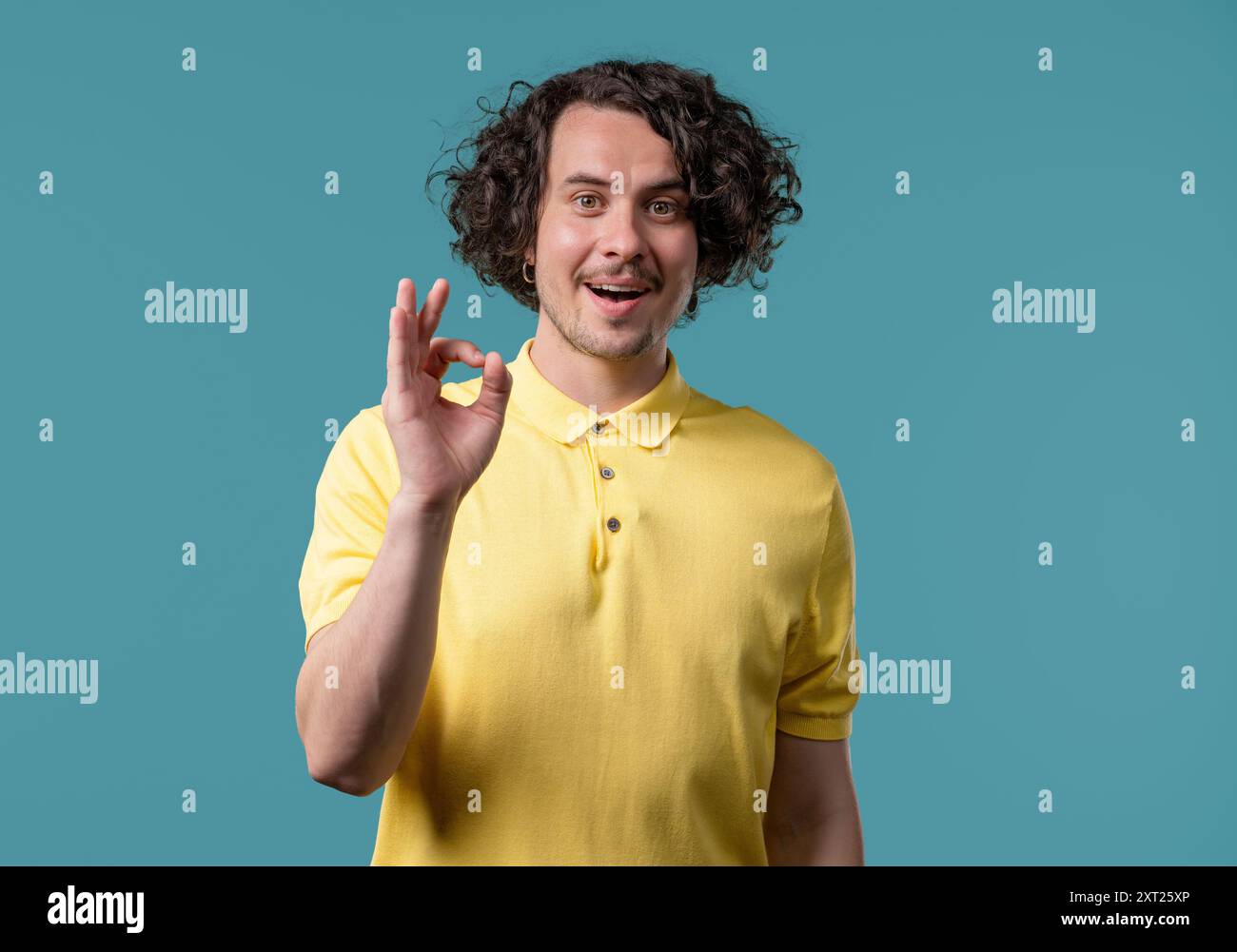 30s handsome man makes sign okay, ok gesture. Happy guy, correct ...