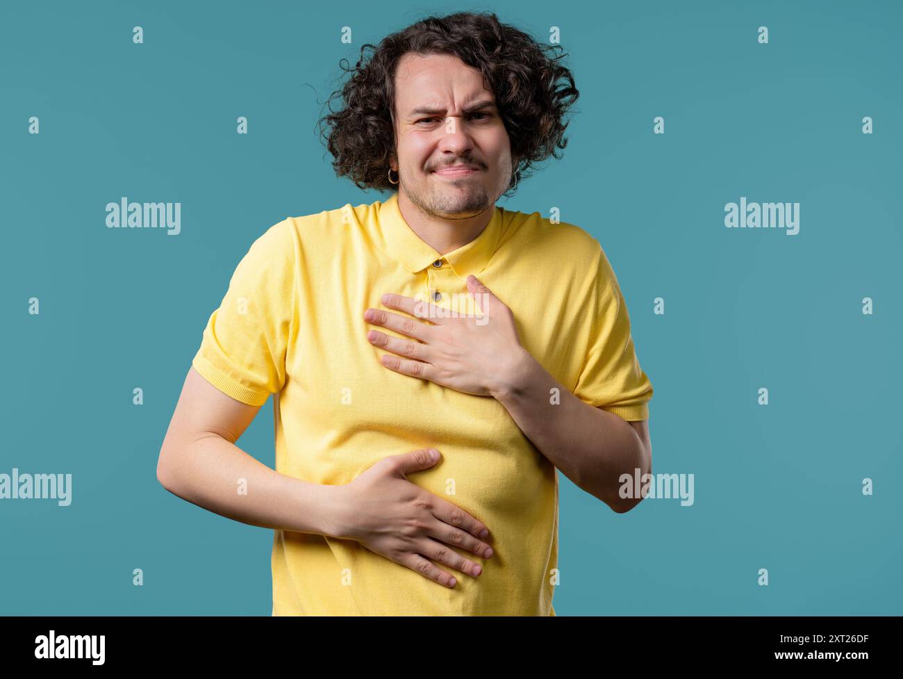 Man squeezing belly, abdominal pain. Suffering digestive system, food ...