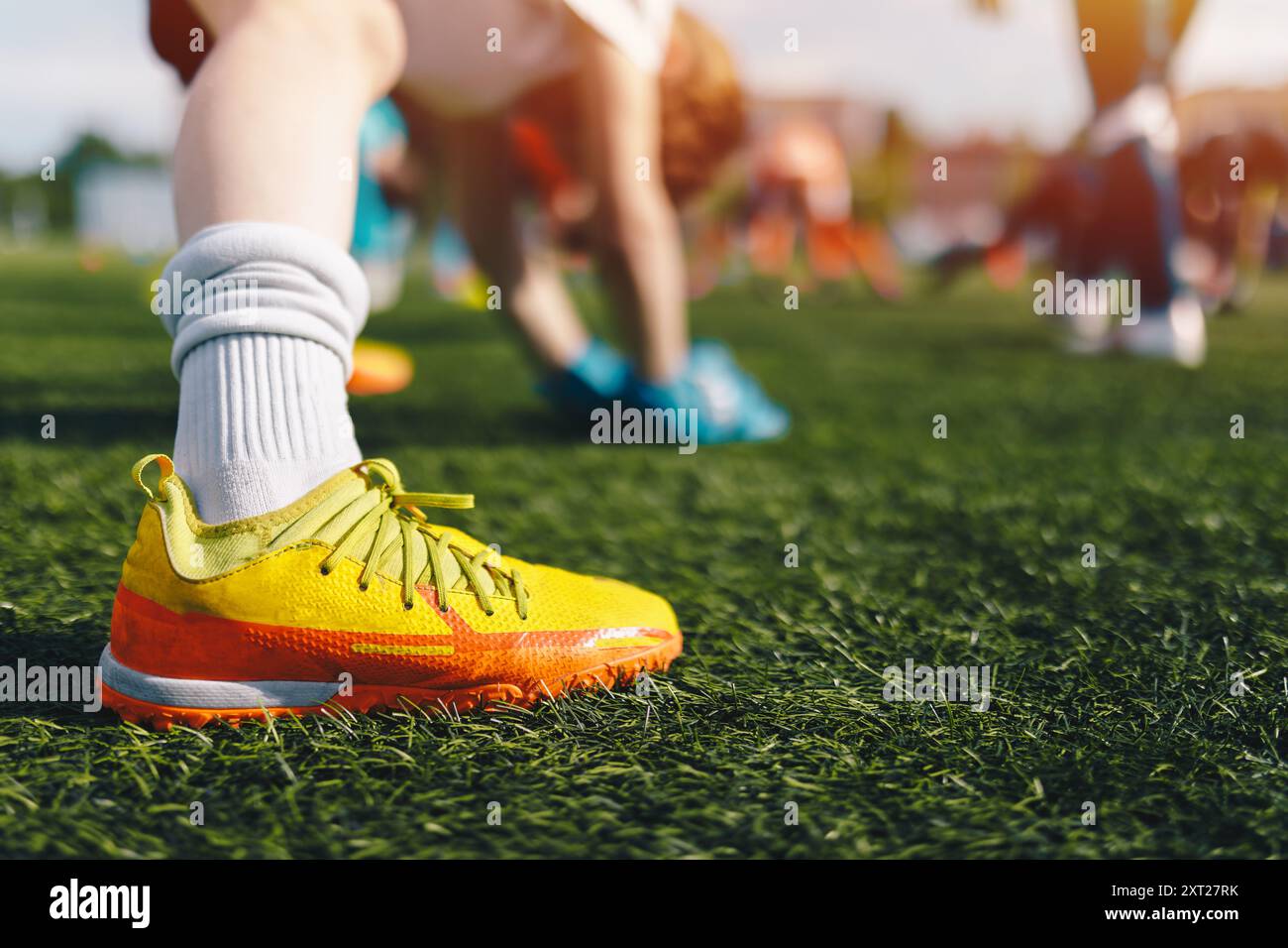 Young Boy Doing Soccer Stretching Exercises. Kids in Football ...
